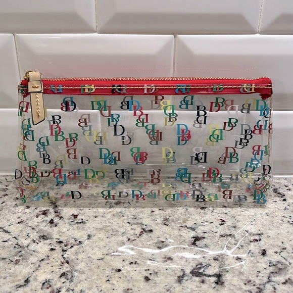Dooney & Bourke | Bags | Dooney Bourke Clear Cosmetic Case Euc | Poshmark